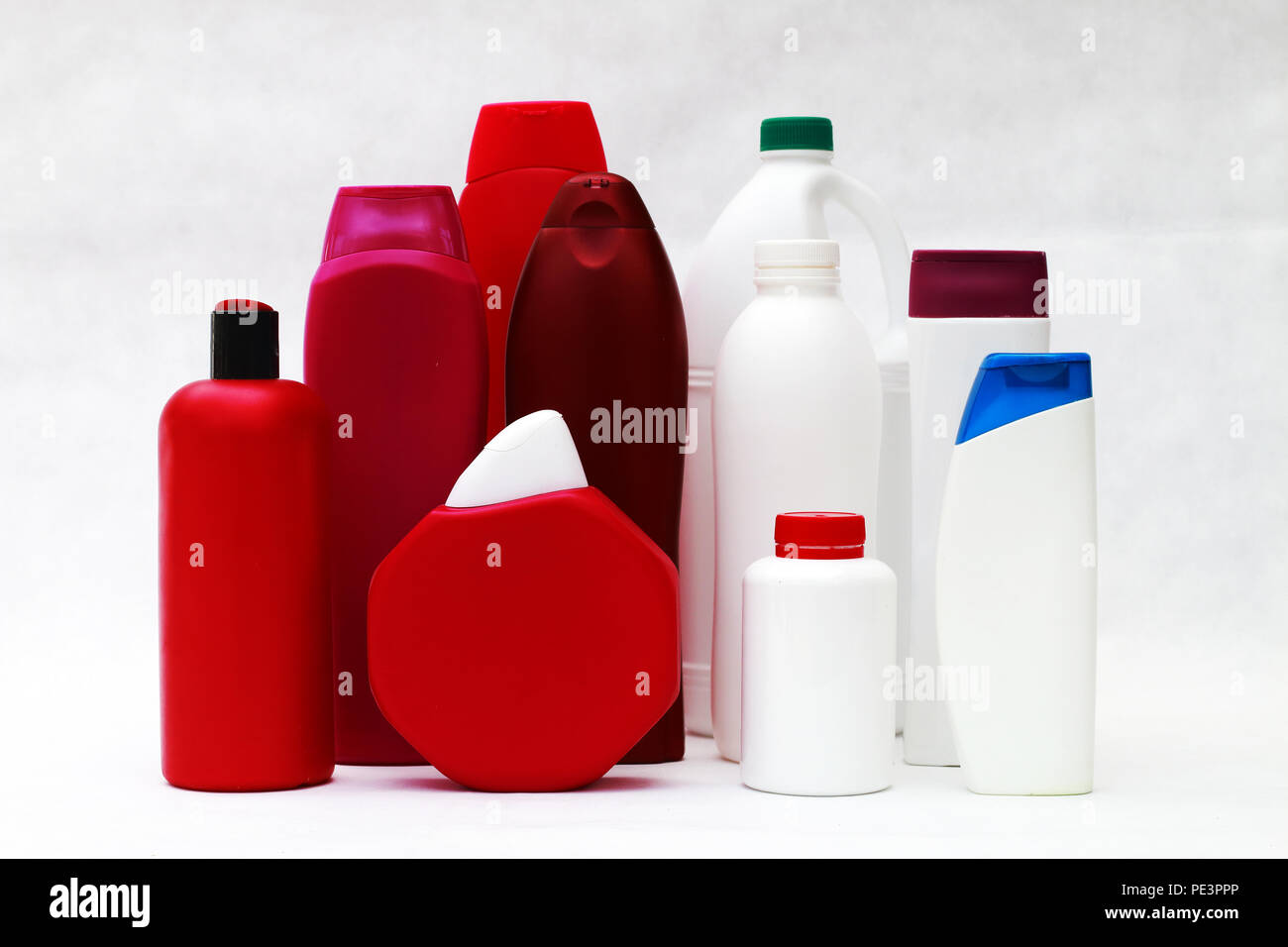 Plastic containers of different shapes and colors Stock Photo - Alamy