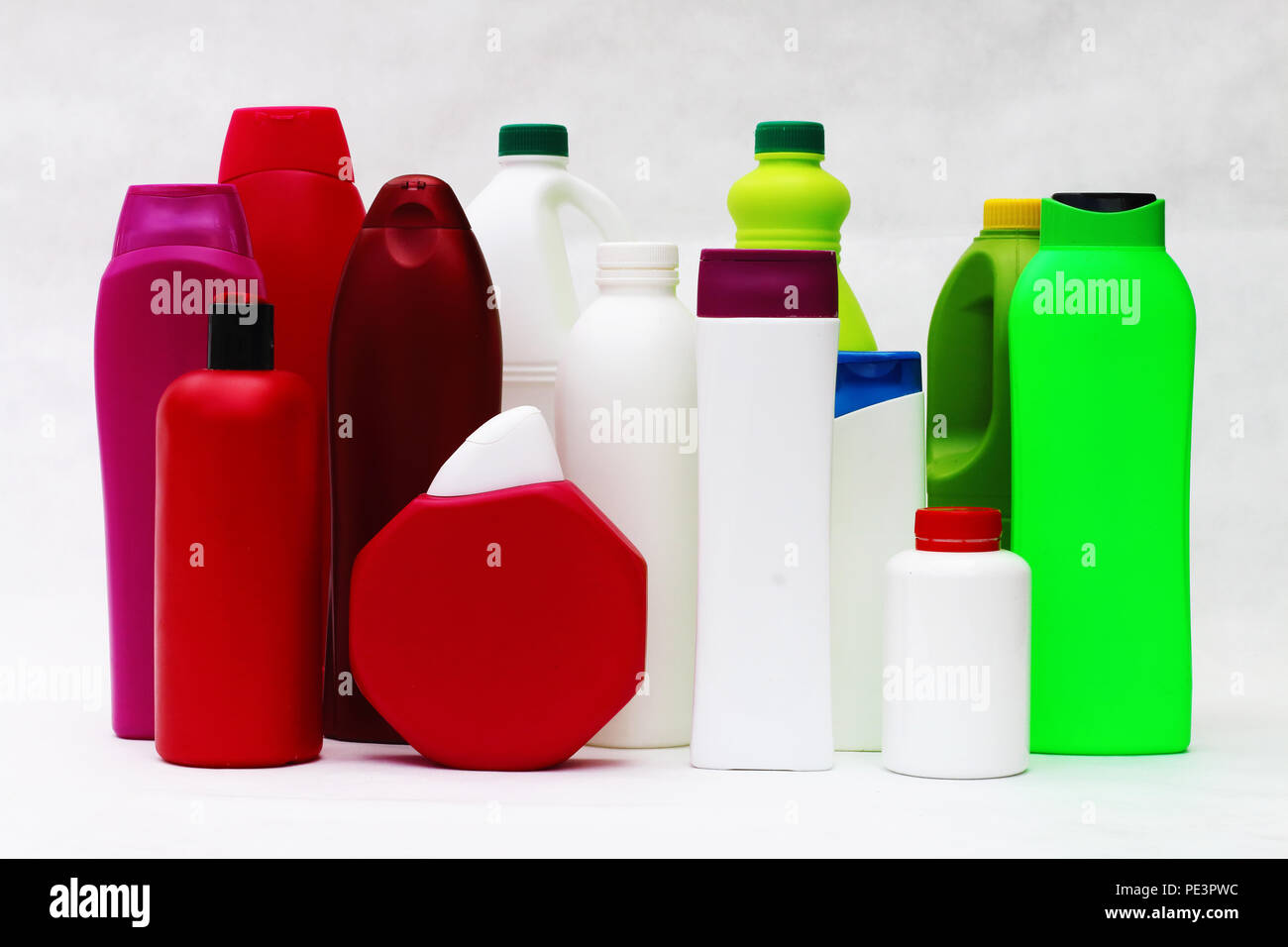 Plastic containers of different shapes and colors Stock Photo - Alamy