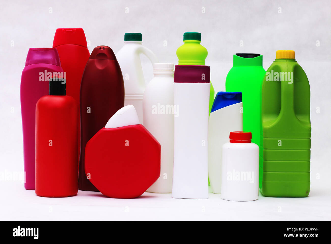 Plastic containers of different shapes and colors Stock Photo - Alamy