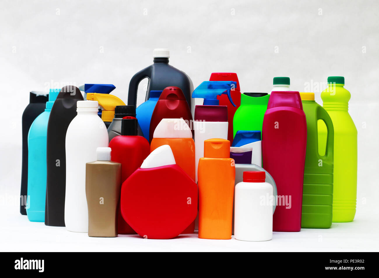 Plastic containers of different shapes and colors Stock Photo - Alamy