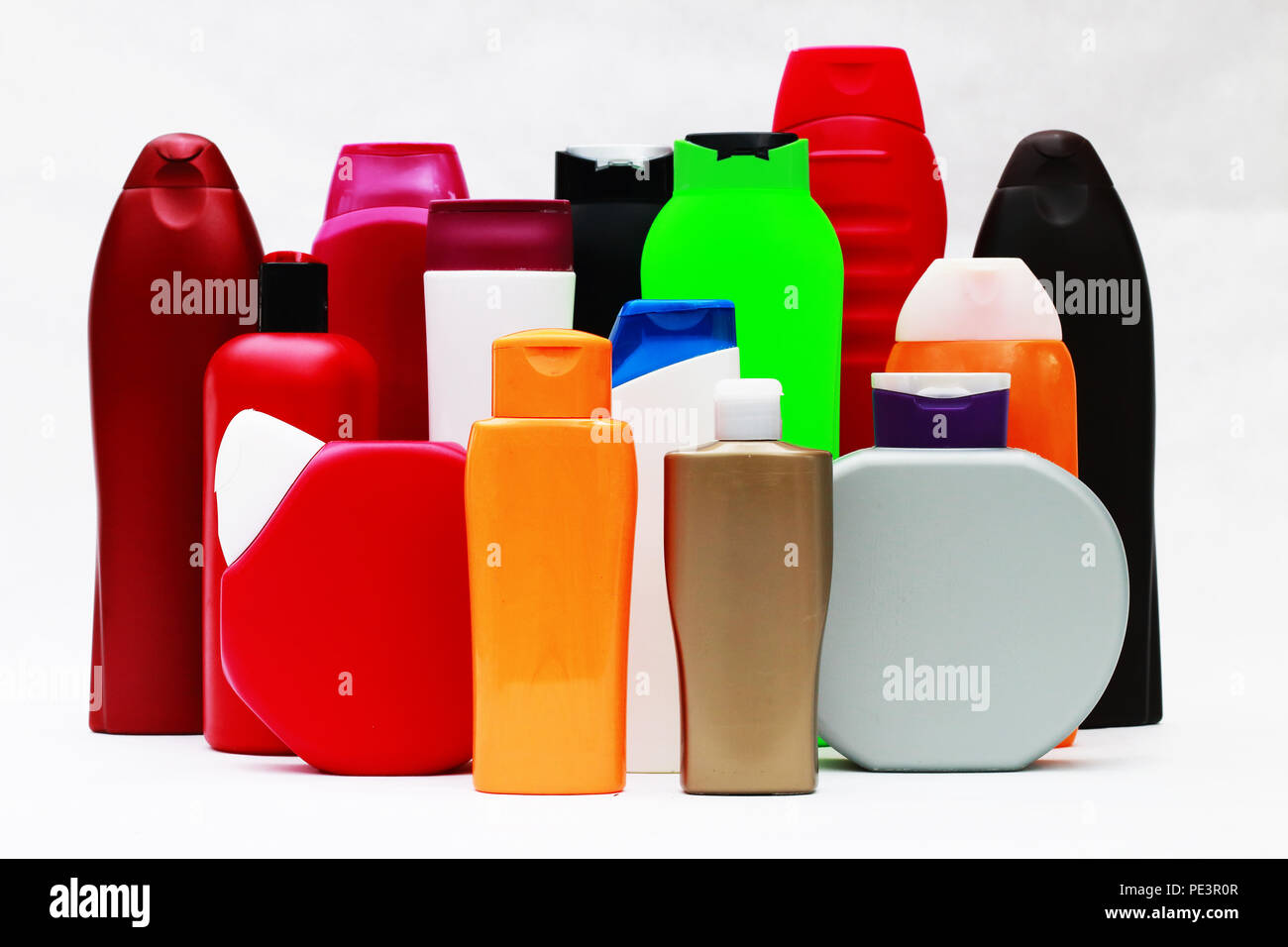 Plastic containers of different shapes and colors Stock Photo - Alamy