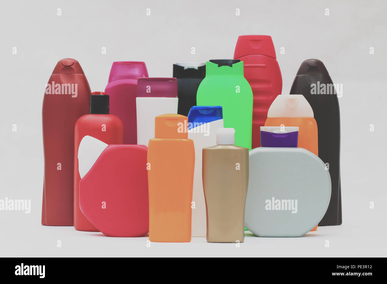 Plastic containers of different shapes and colors Stock Photo - Alamy