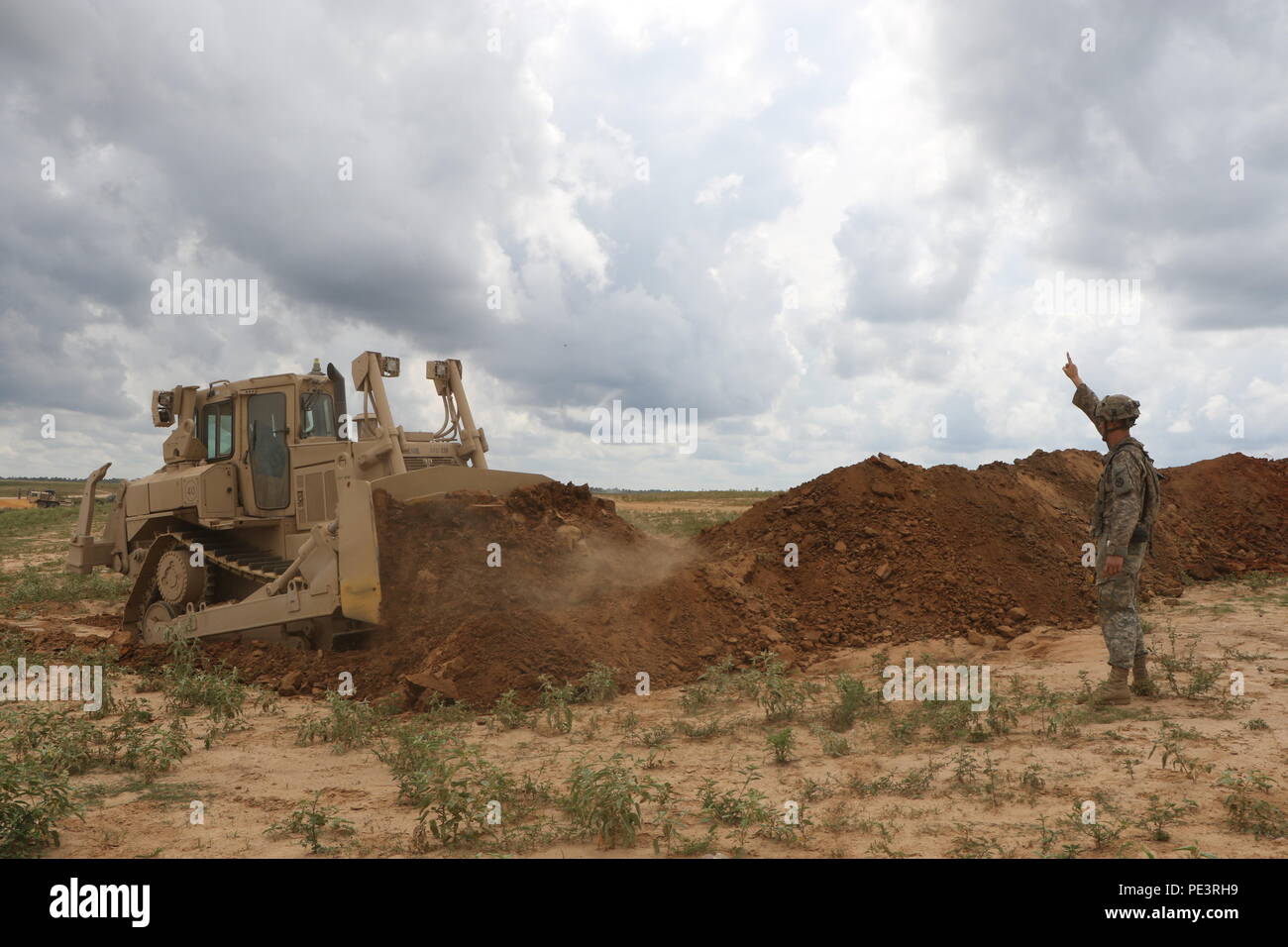 Sgt. Matthew Fuller, an equipment operator with the 1192nd Engineer ...