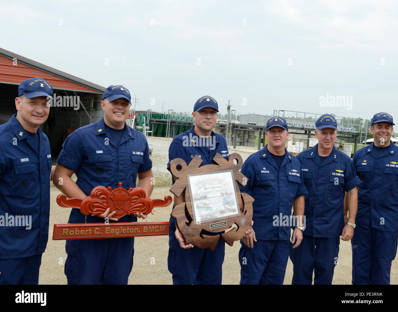 Master Chief Petty Officer Robert Eagleton is presented with the Coast ...