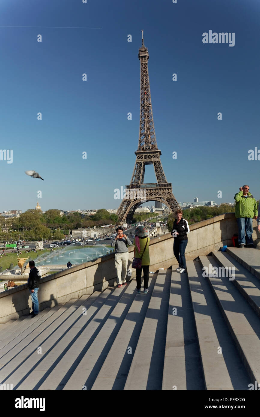 The Eiffel Tower shot from different locations and angles with close ...