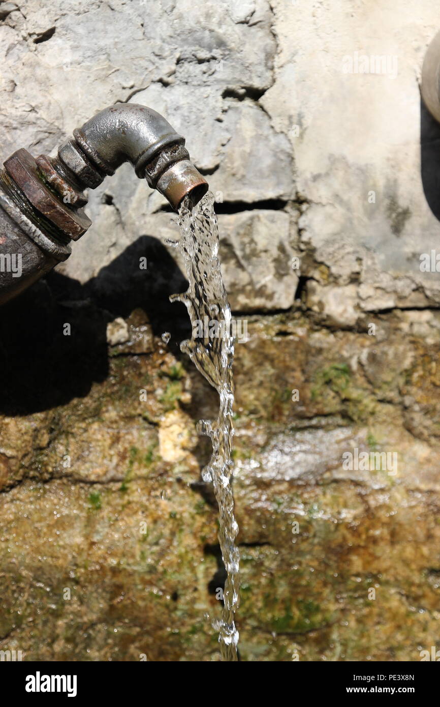 constantly flowing tap Stock Photo - Alamy
