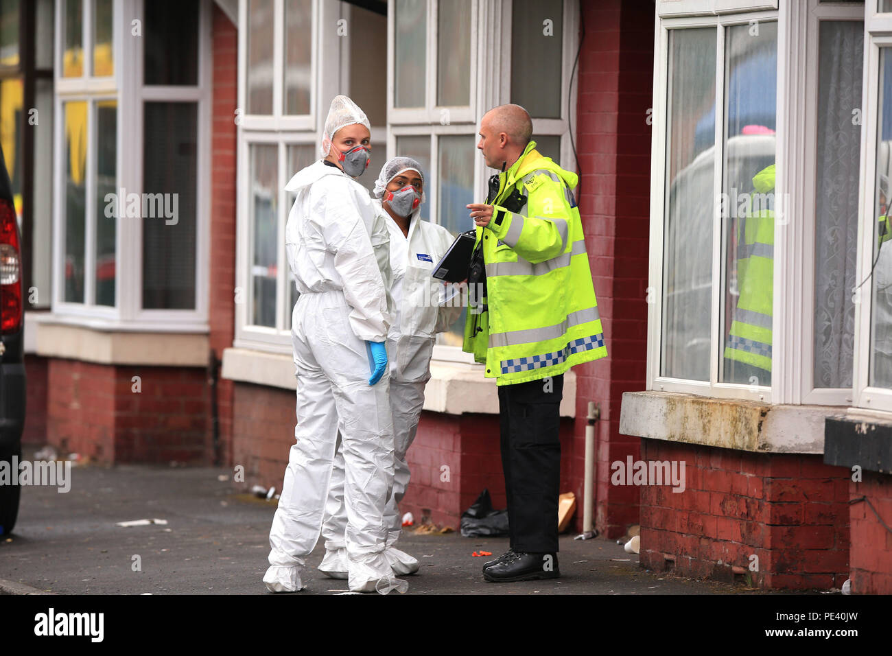 Forensics police officer at the scene in claremont road hi-res stock ...