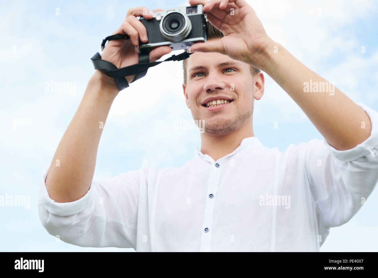 Man with camera Stock Photo - Alamy