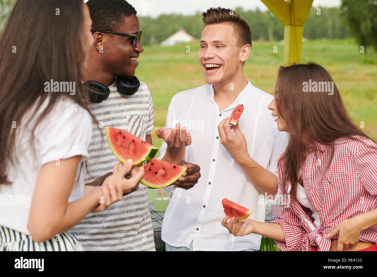 Friends having fun outdoors Stock Photo - Alamy