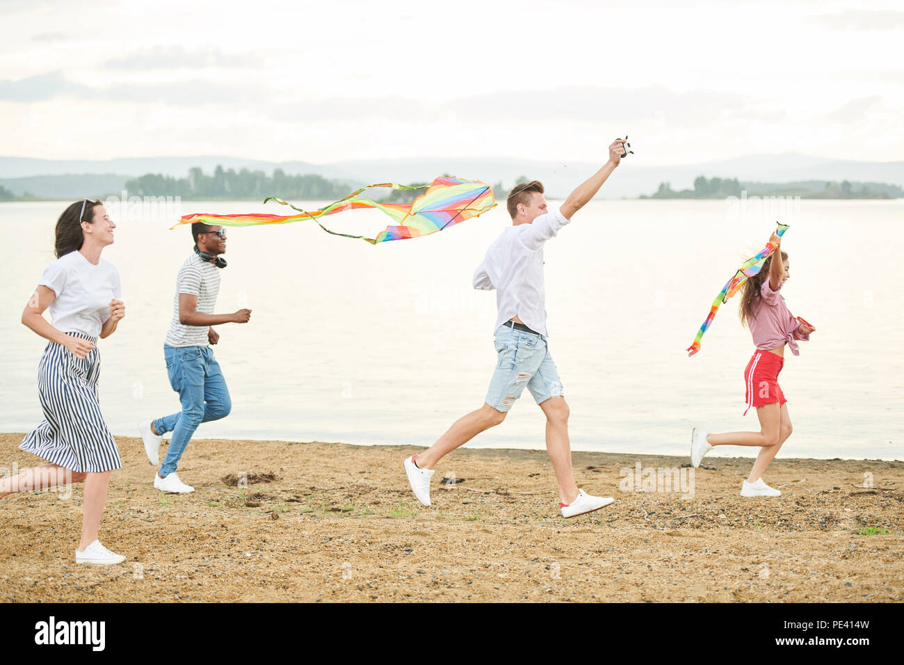 People having fun on the beach Stock Photo - Alamy