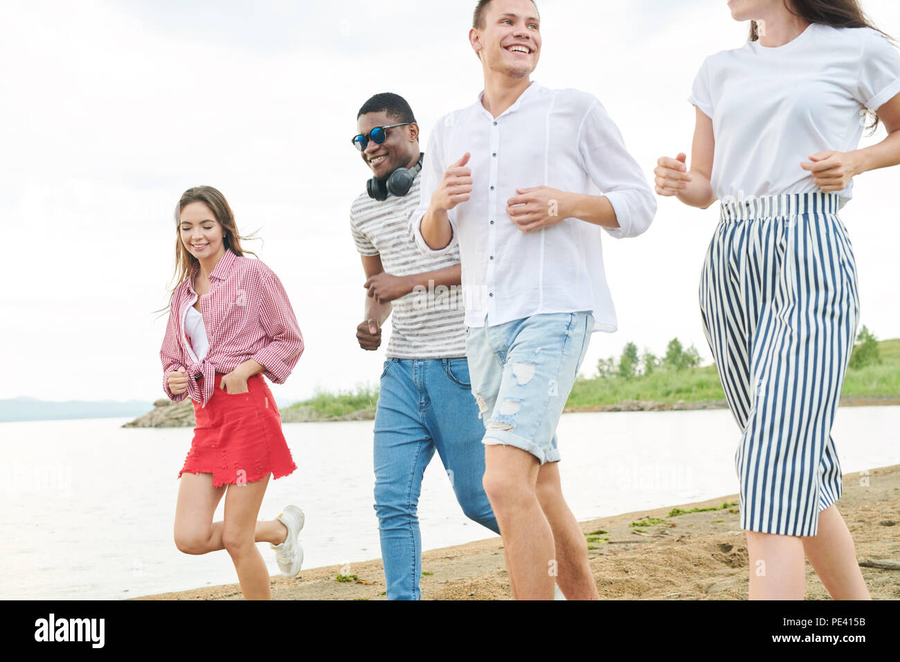 Jogging along the lake Stock Photo - Alamy