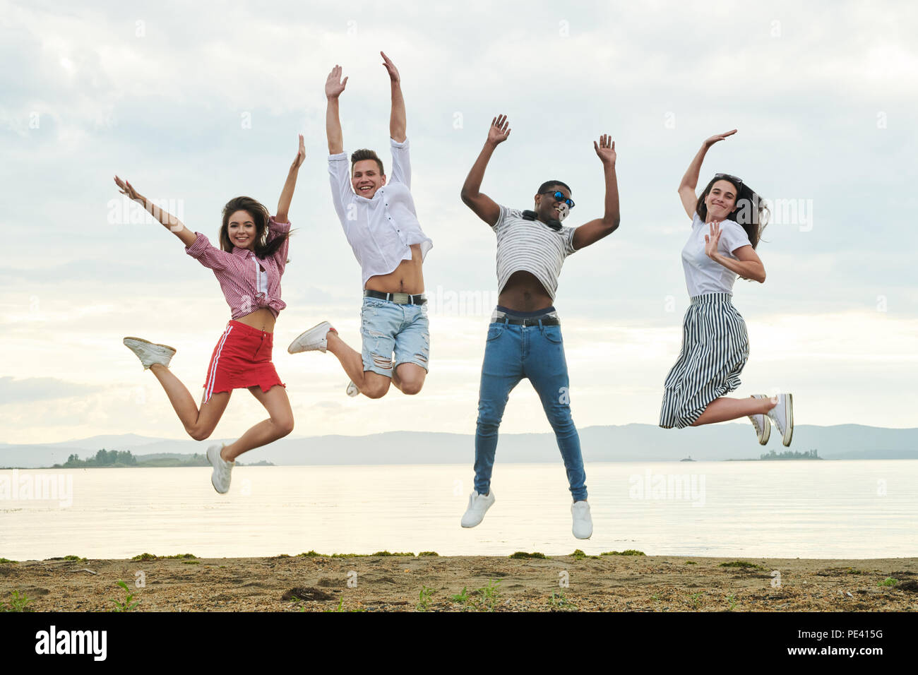 Group ecstatic friends having party hi-res stock photography and images ...