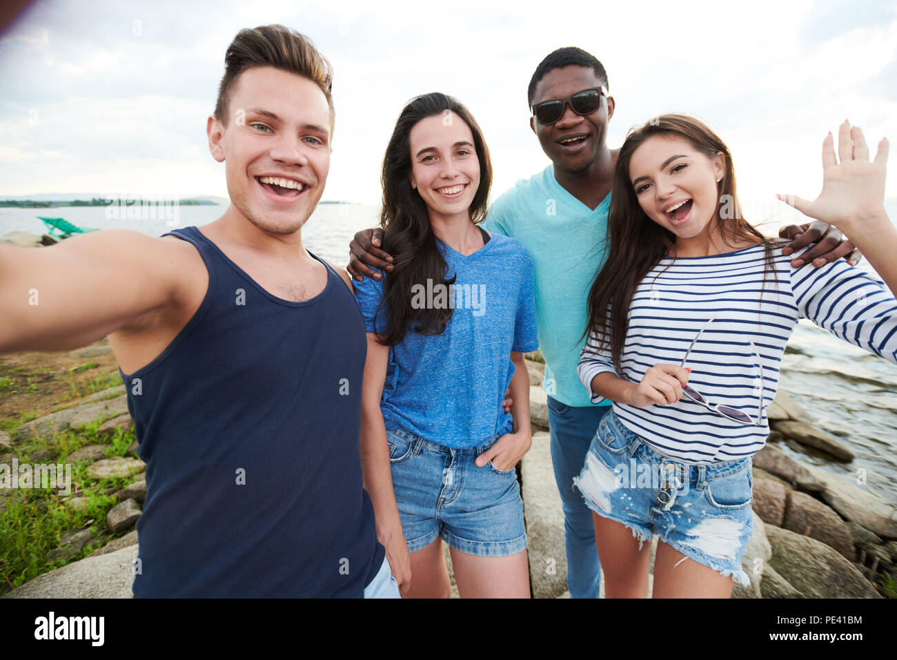 Two young couples outdoors Stock Photo - Alamy