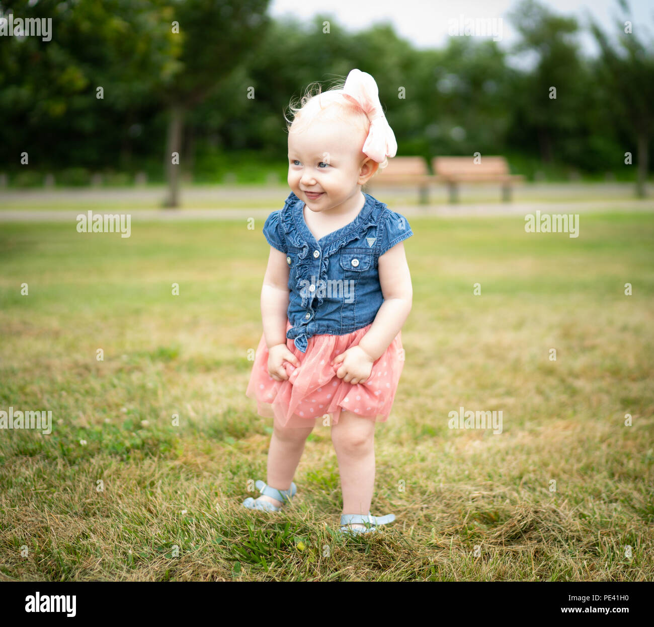 Baby girl first steps Stock Photo - Alamy
