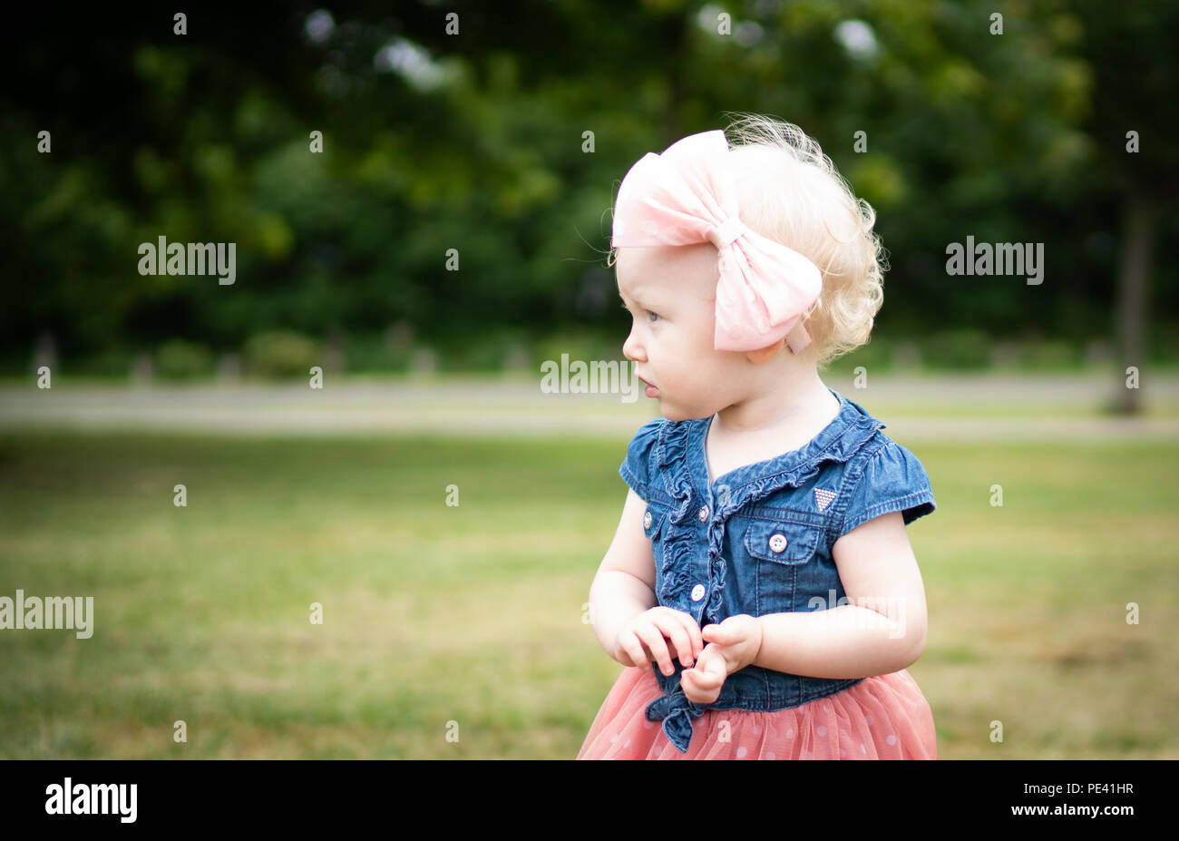Baby girl first steps Stock Photo - Alamy