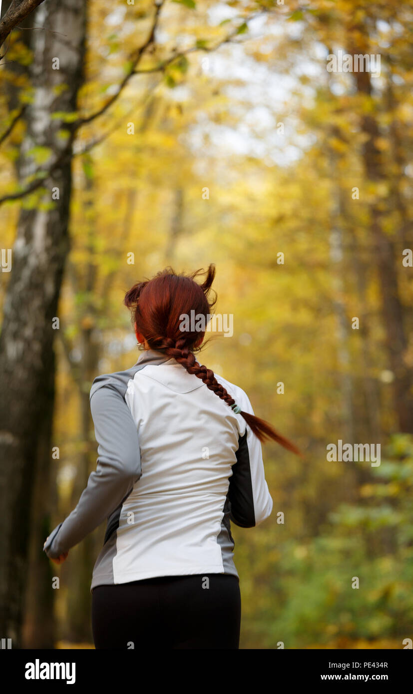 Photo of young girl on morning run Stock Photo - Alamy