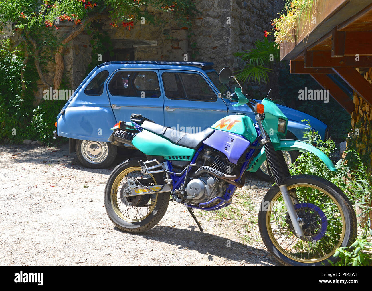 Citroen and bike outside cottage in Perouges, France Stock Photo - Alamy