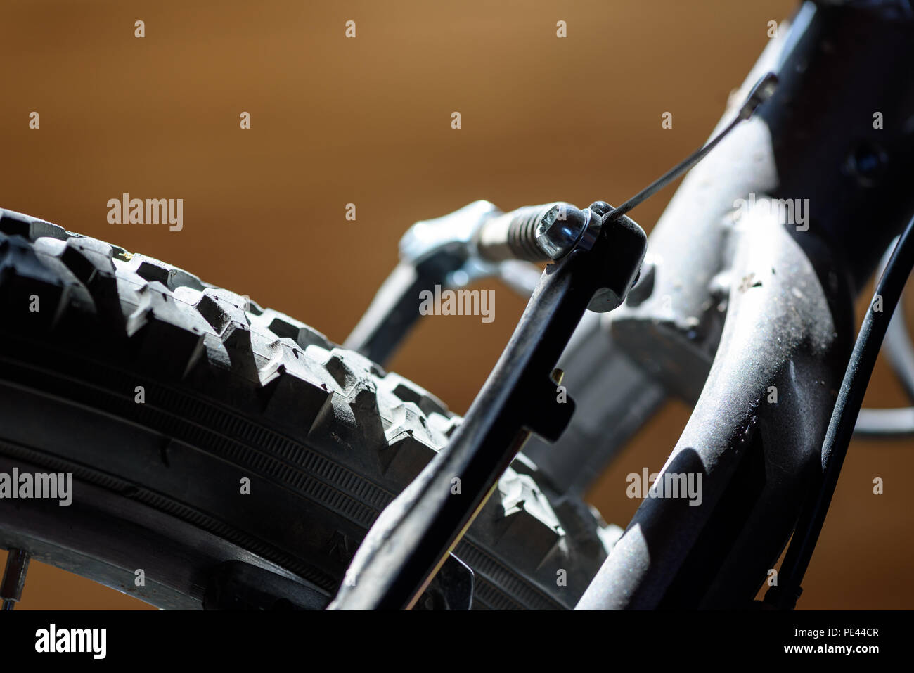 Closeup image of a cycles rear brake system with defocused wheel and ...