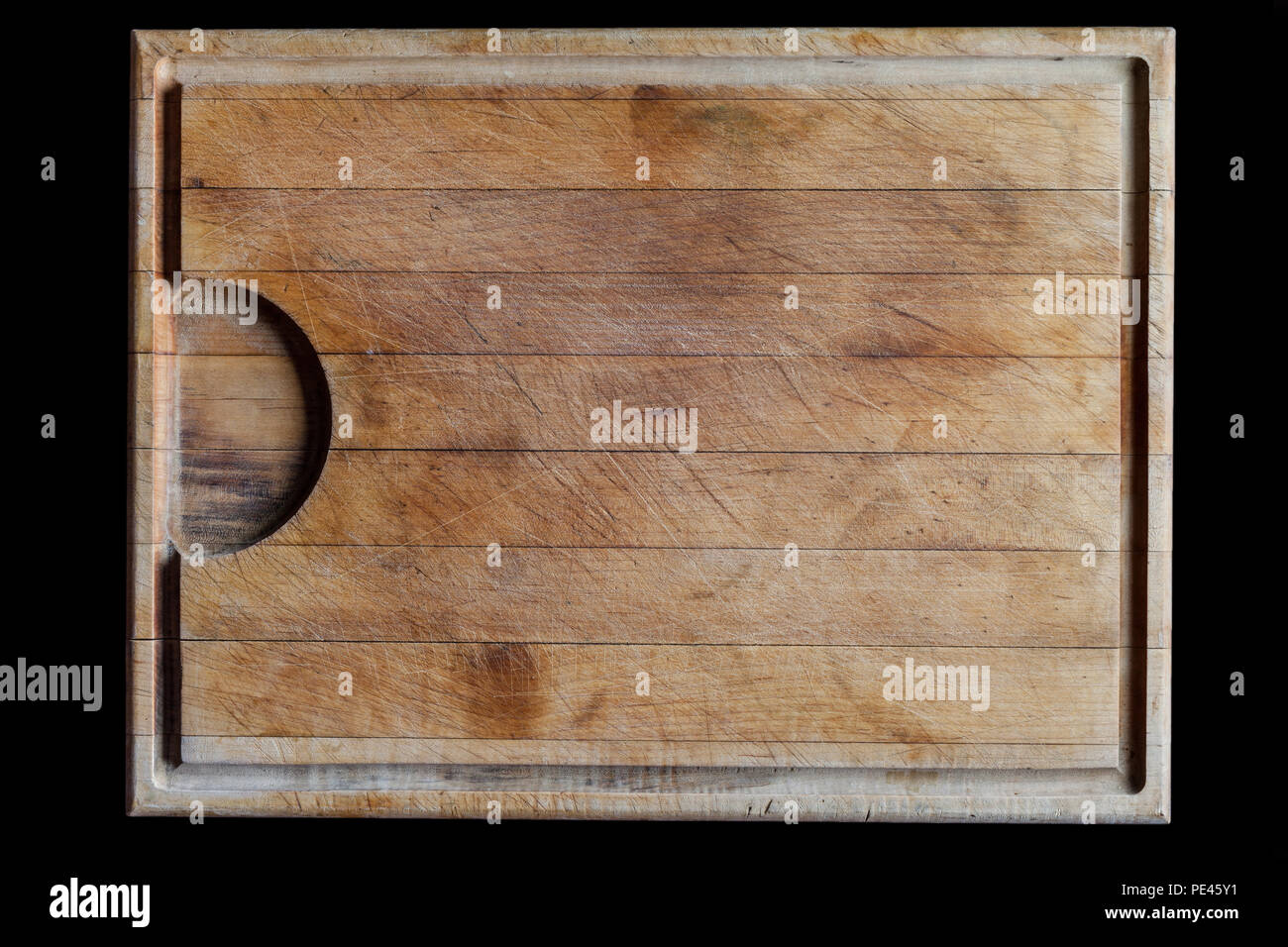 Rough wooden rectangular used cutting board background with horizontal ...