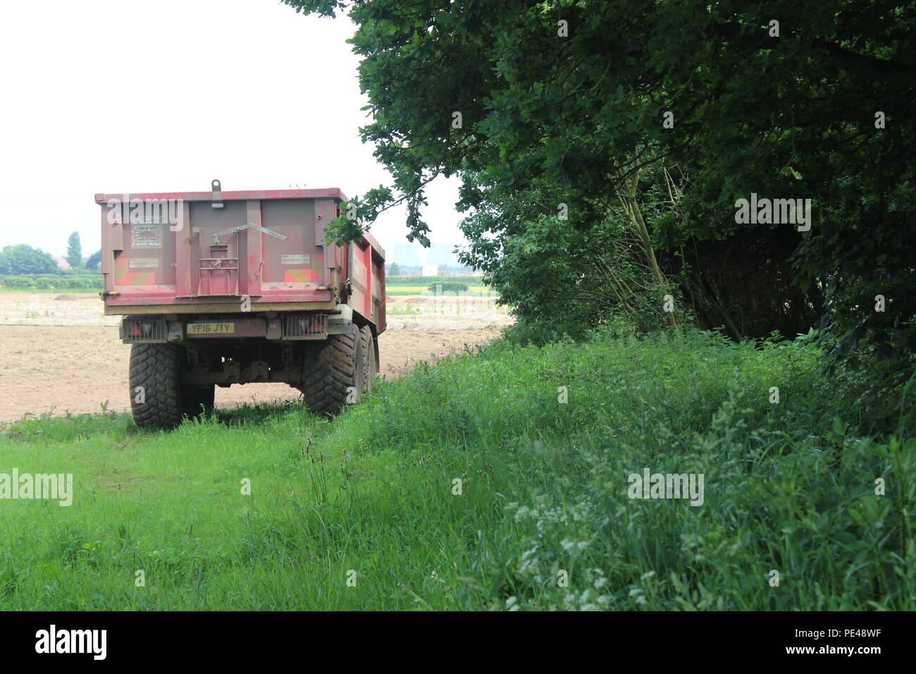 Green farm trailer red hi-res stock photography and images - Alamy