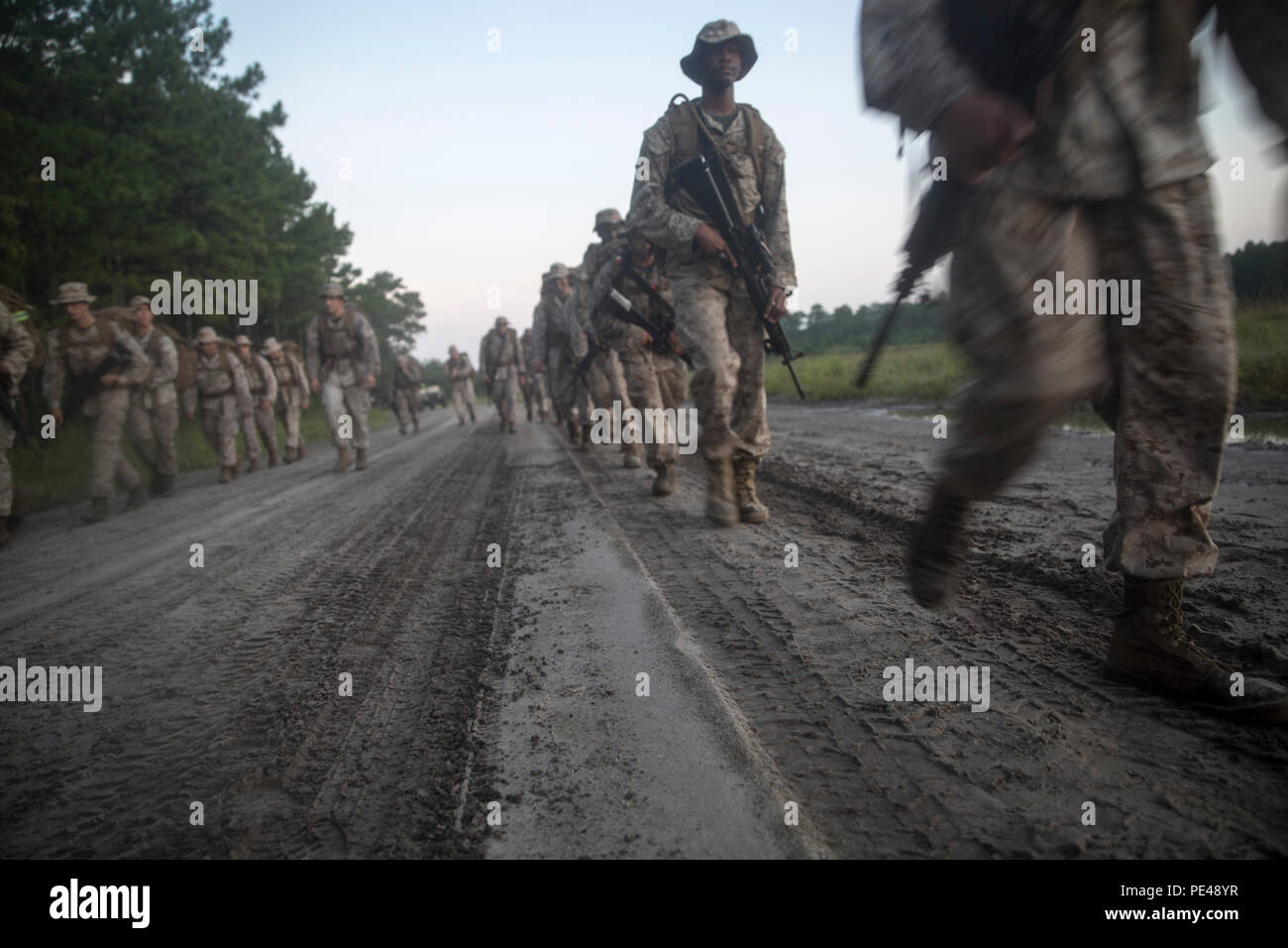 Marines with Headquarters Company, Combat Logistics Regiment 2, march ...