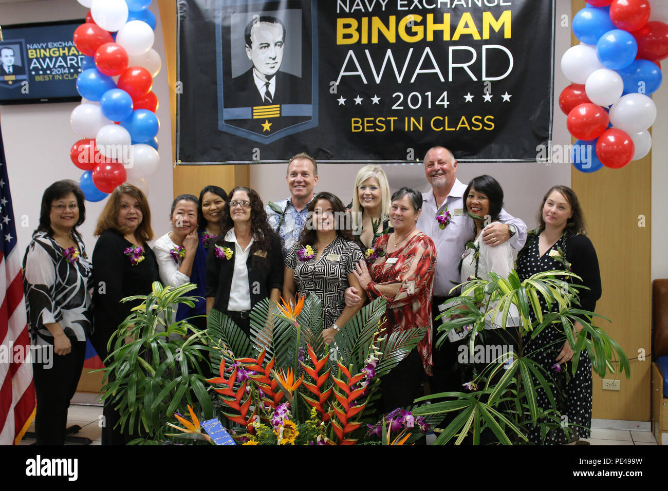SANTA RITA, Guam (Sept. 3, 2015) – Members of the NEX Guam team gather ...