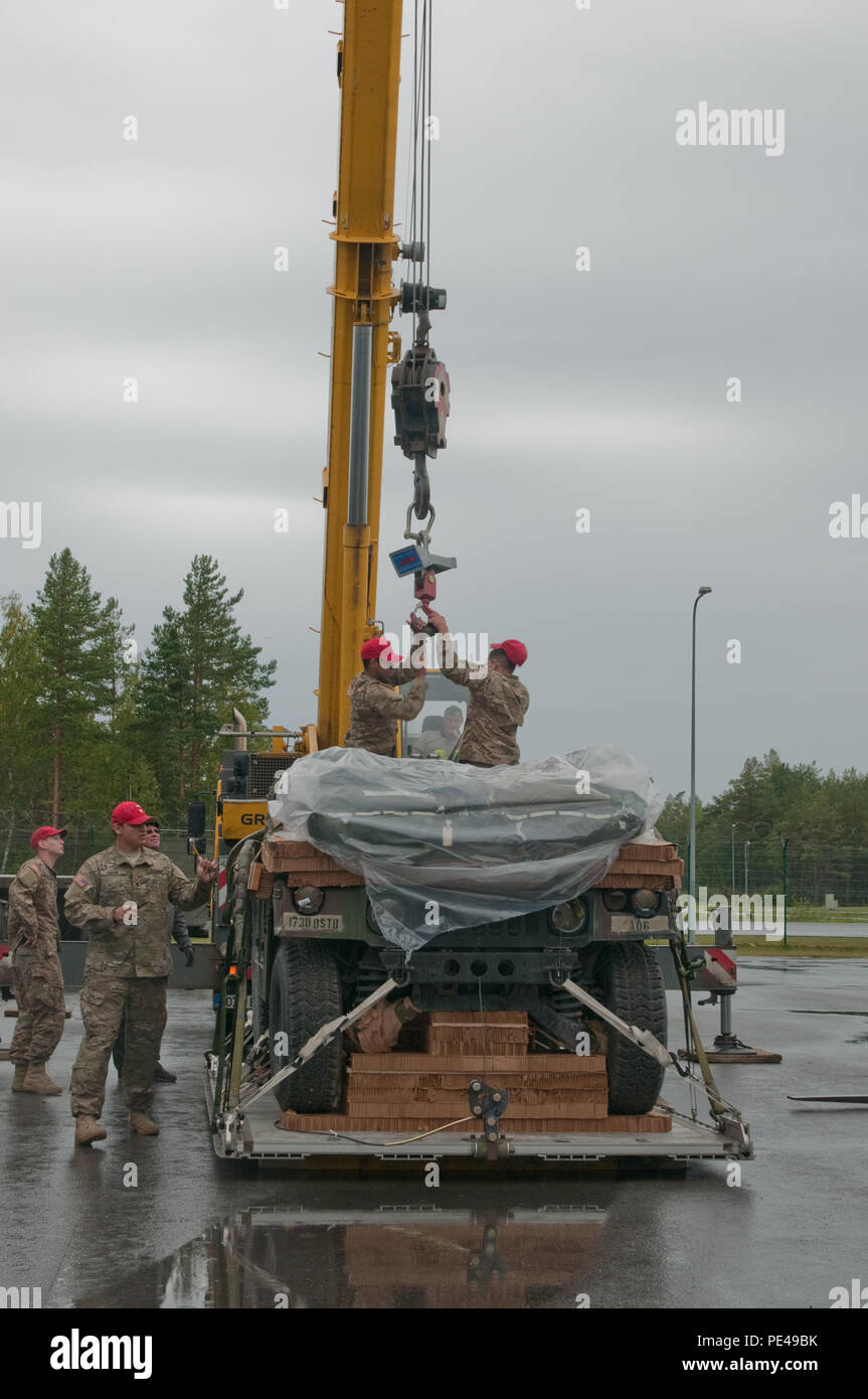 Spc. Carlos Segarra (top left), of Ponce, Puerto Rico, and Spc. Lorenzo ...