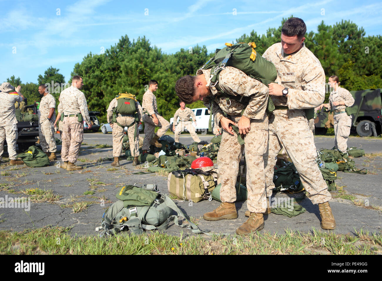 A Marine with 2nd Radio Battalion, II Marine Expeditionary Force, helps ...
