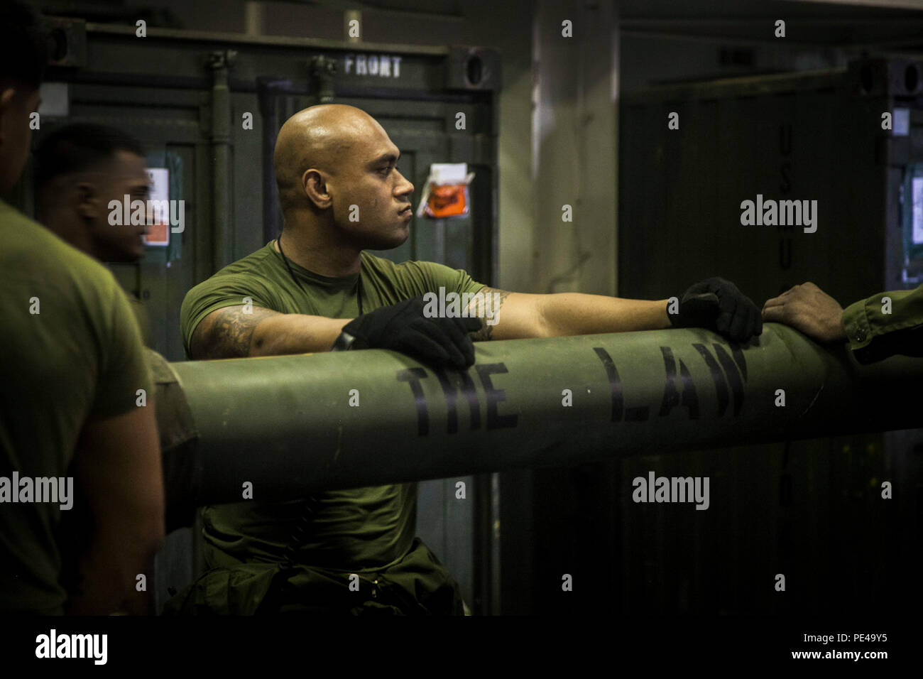 ARABIAN GULF (Sept. 4, 2015) U.S. Marine Sgt. Mose Kitiona waits to ...