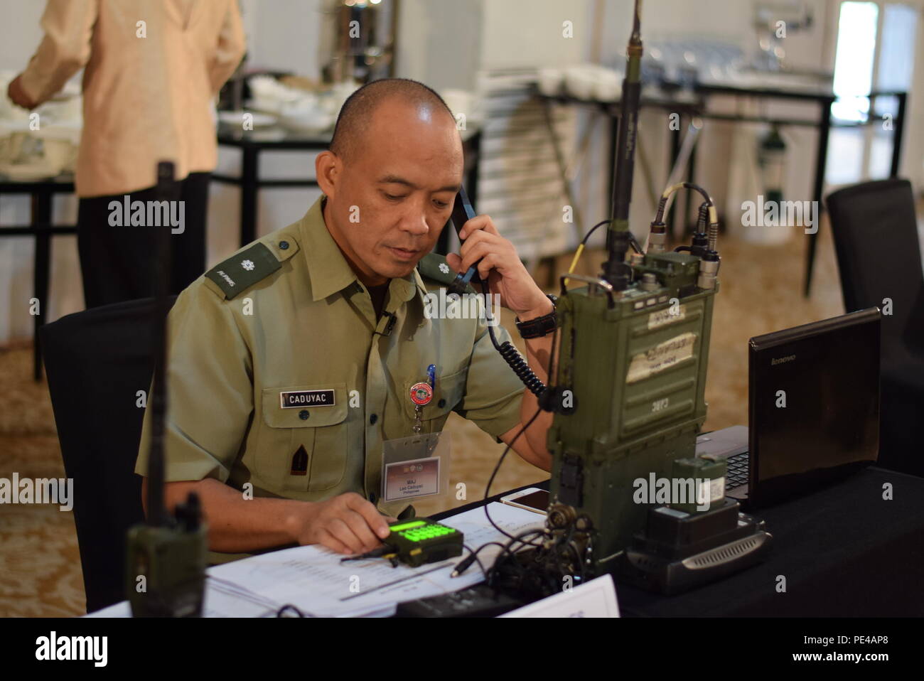 Major Leo Caduyac, a Philippine Army Signal Command Soldier check radio ...