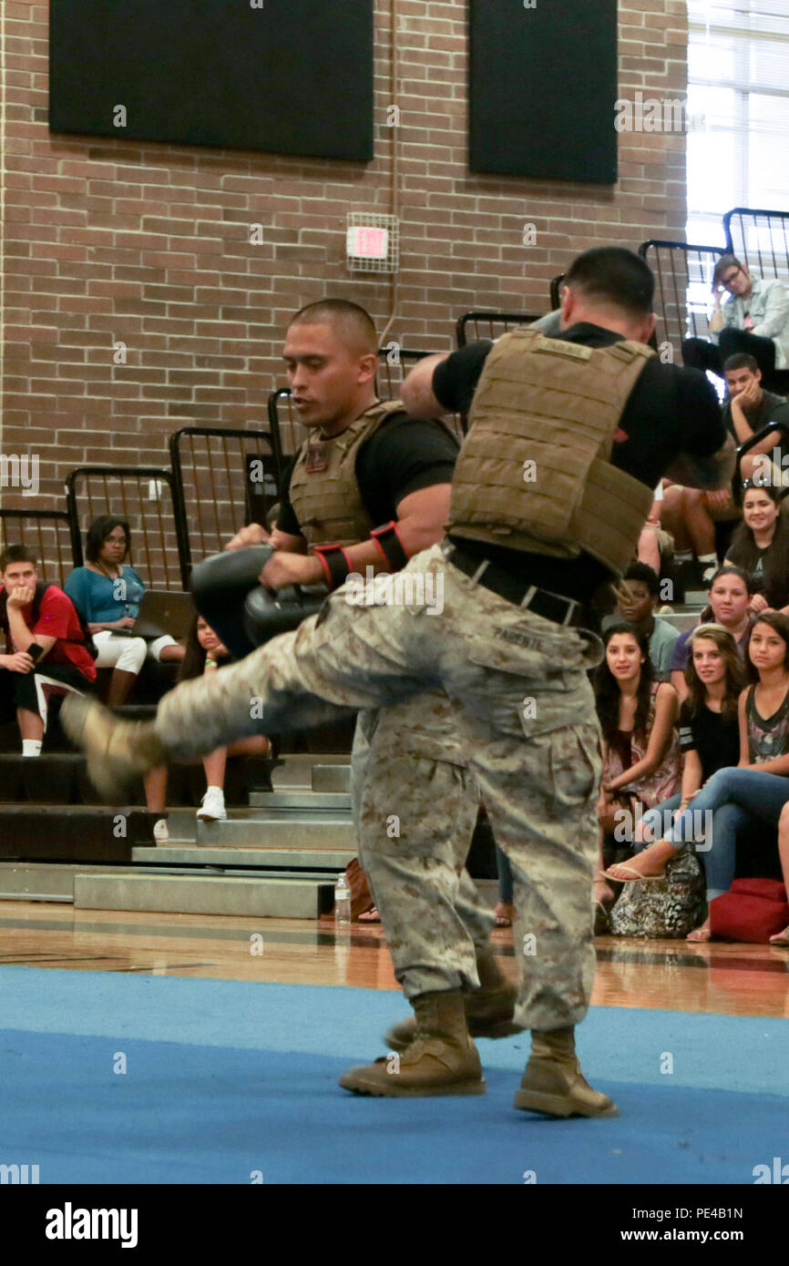 U.S. Marine Corps Sgt. Christopher Flores, left, and Sgt. Robert W ...