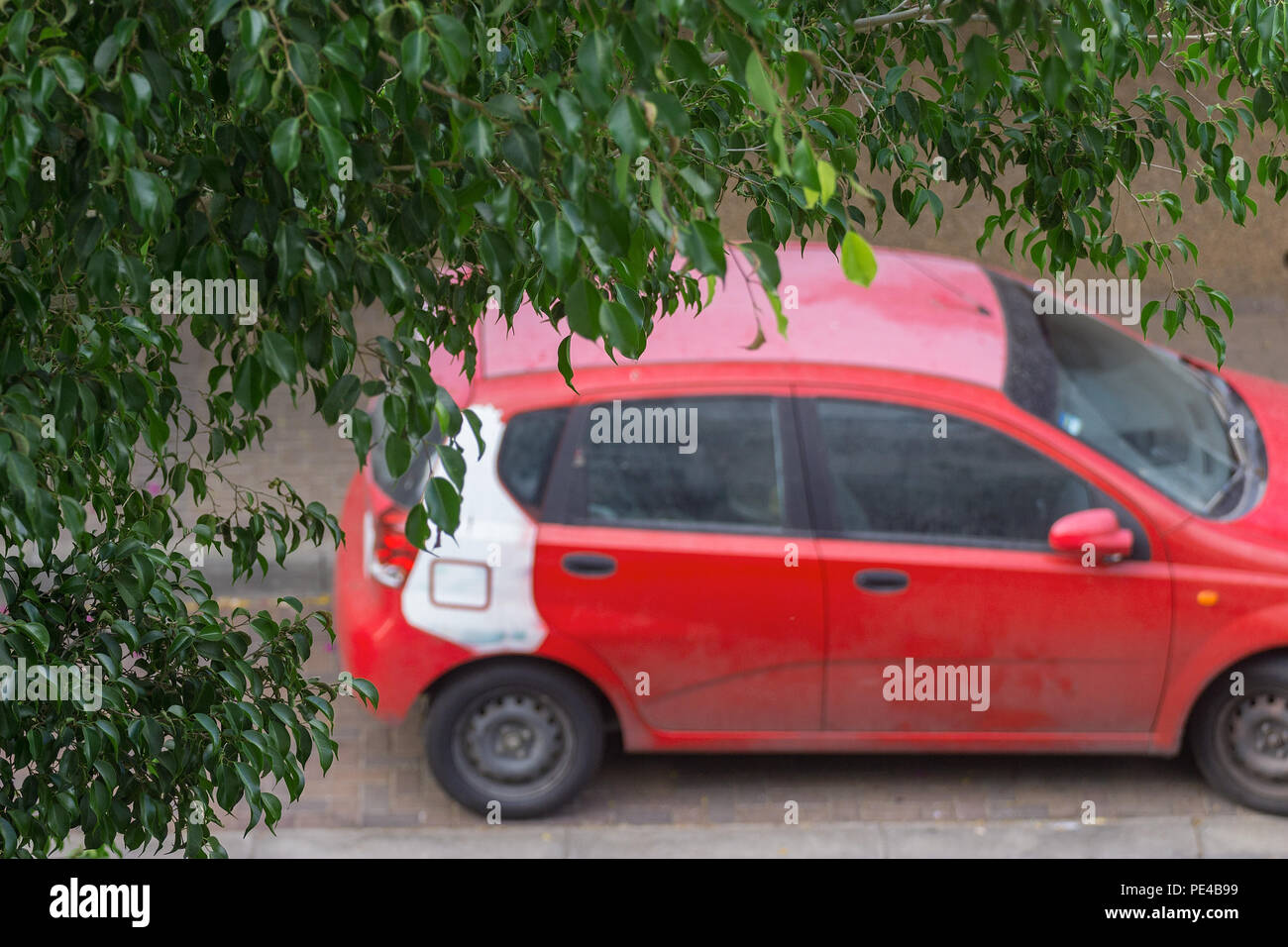 Small red car hi-res stock photography and images - Alamy
