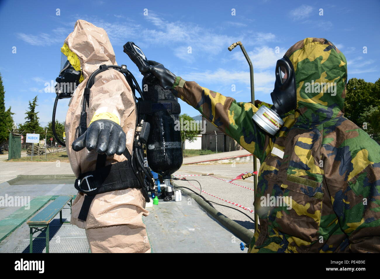 Italian army soldiers from the 7th Nuclear, Biological and Chemical Defense Regiment demonstrate ...