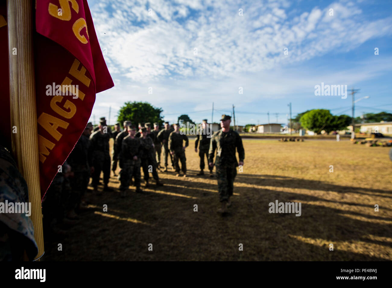 U.S. Marine Corps Lt. Col. David T. Hudak, center, commanding officer ...