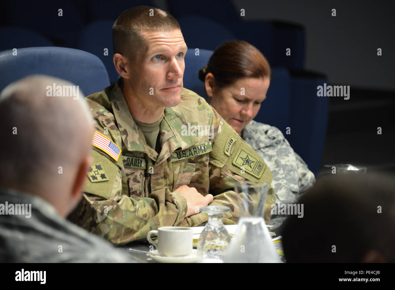 Sgt. Maj. of the Army Daniel A. Dailey (center) receives an overview on ...