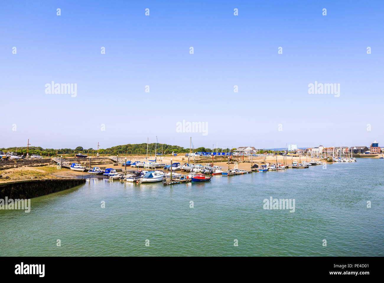 Panoramic view along the River Arun estuary with moored sailing boats ...