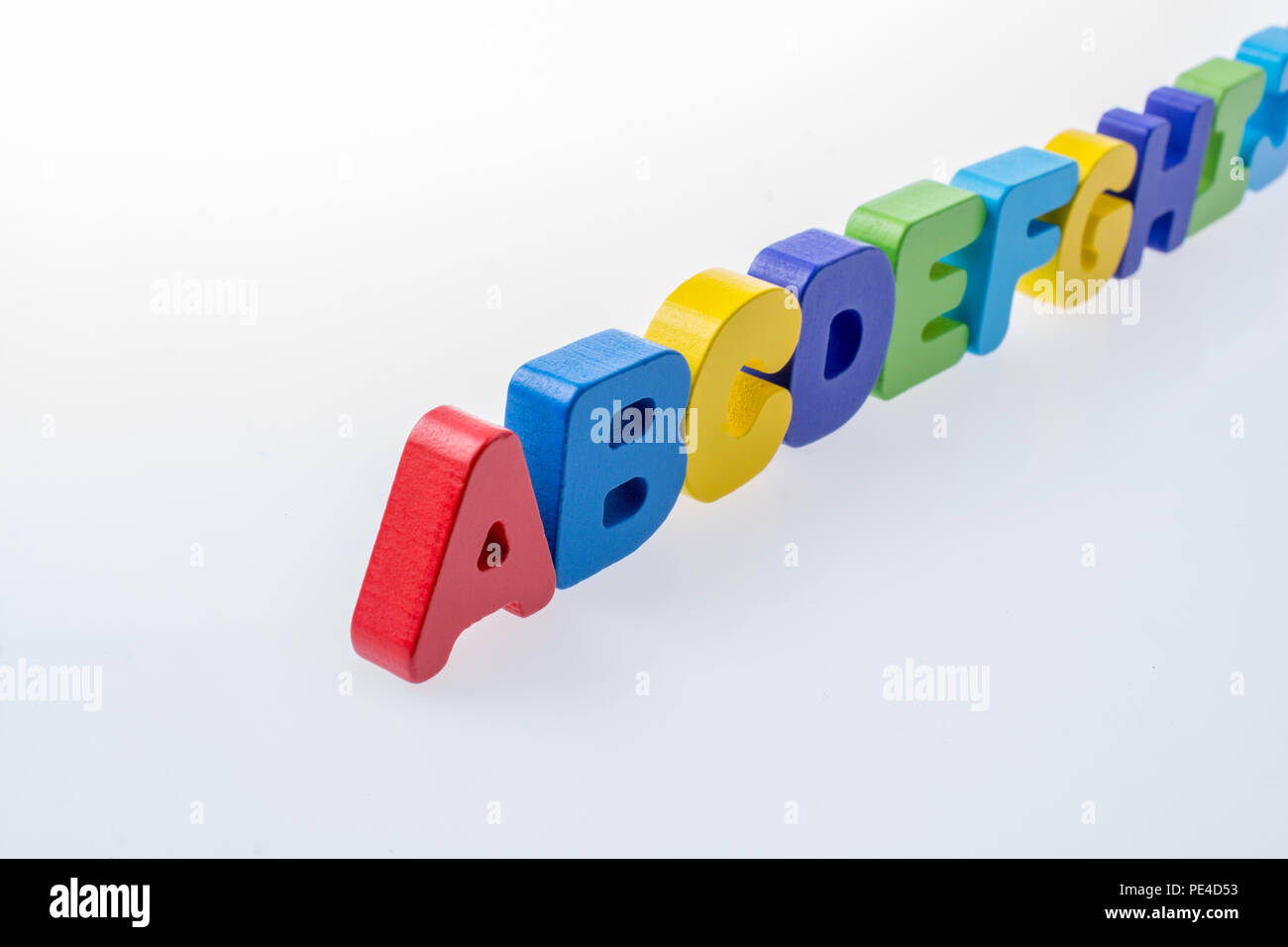 Letter cubes of Alphabet made of wood Stock Photo - Alamy