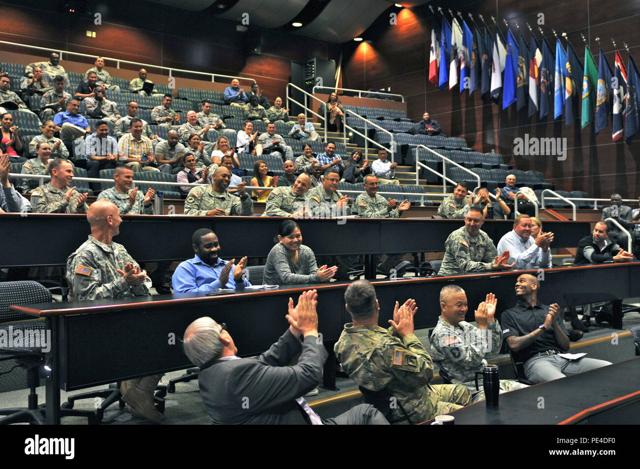 63rd Regional Support Command Soldiers and Civilians react with ...
