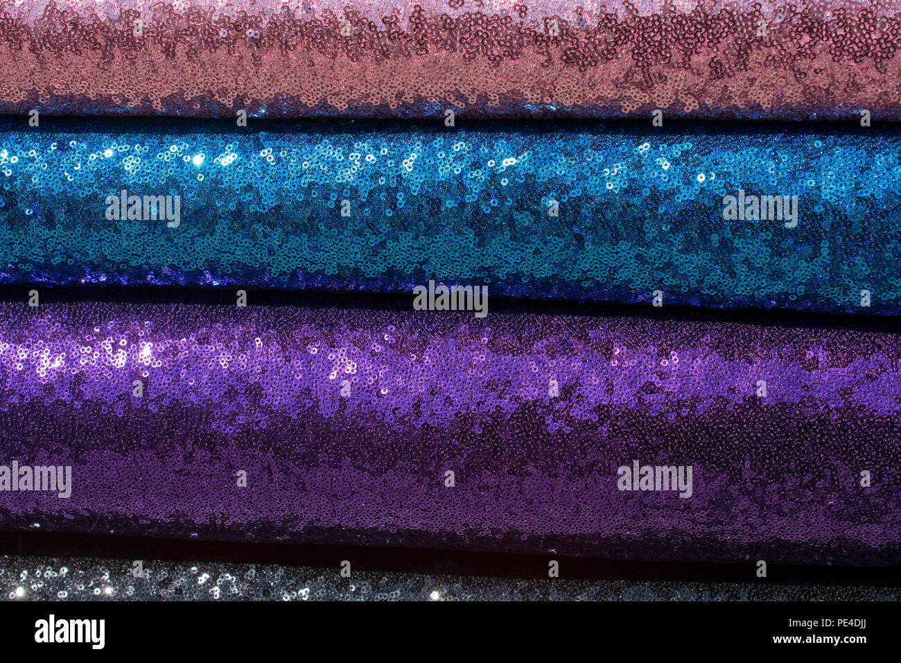 Examples of bright fabric of various color in view Stock Photo - Alamy