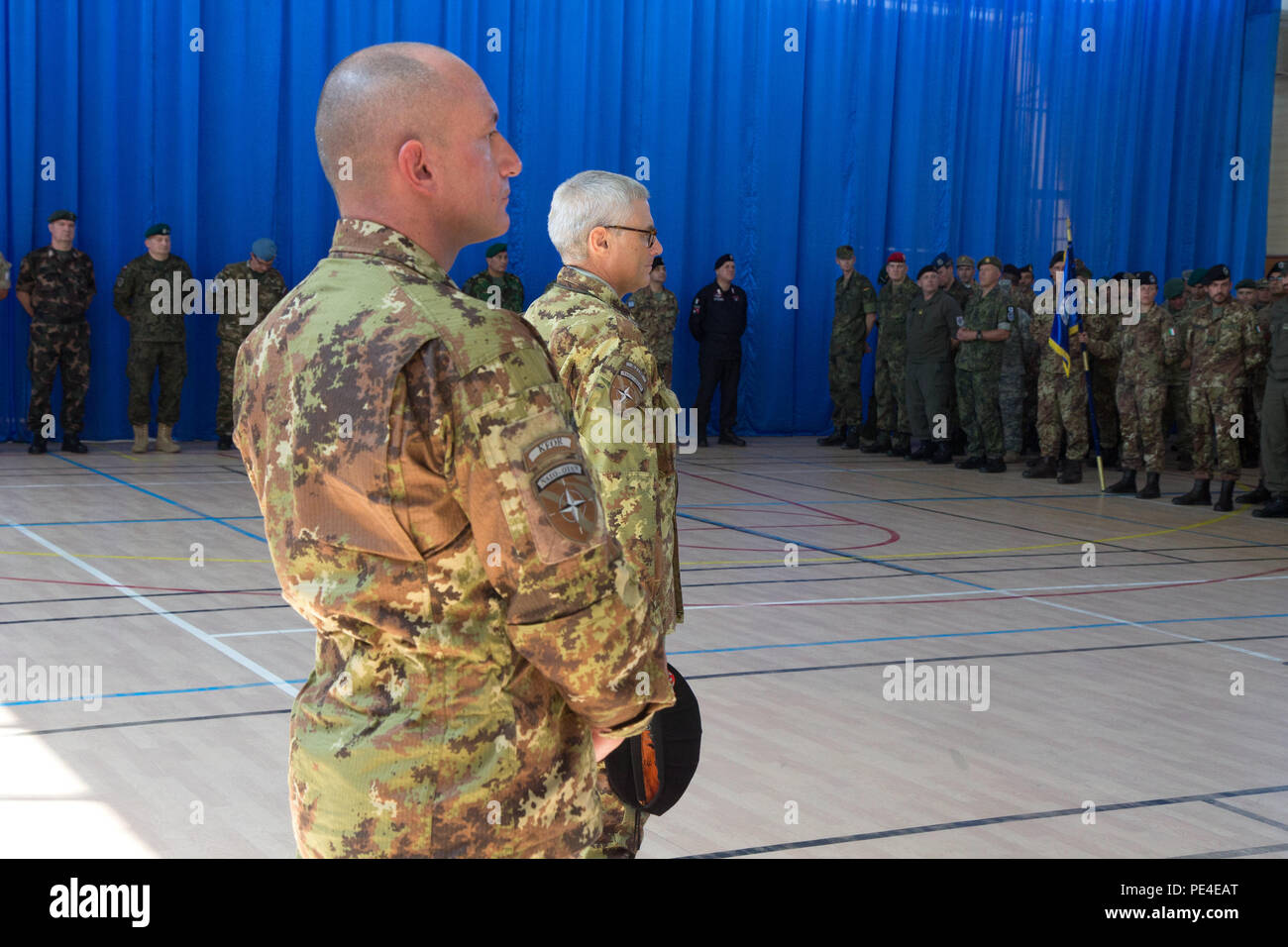 Italian Command Sgt. Maj. Amedeo Russo (left), the Kosovo Force Command ...