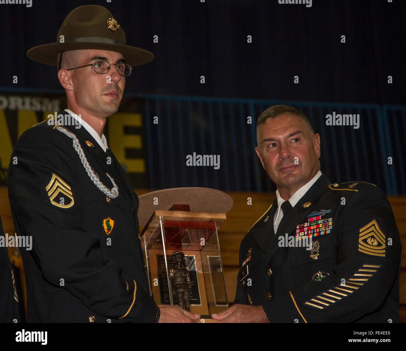 Command Sgt. Maj. Robert J. Riti presents the Ralph E. Haines Jr. Award ...