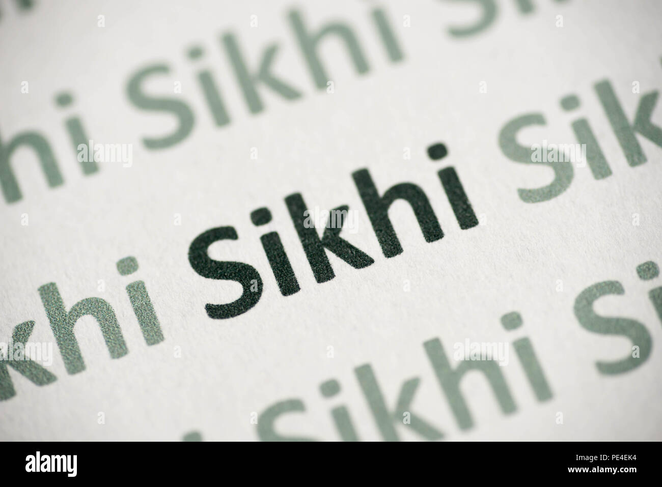 word Sikhi printed on white paper macro Stock Photo - Alamy