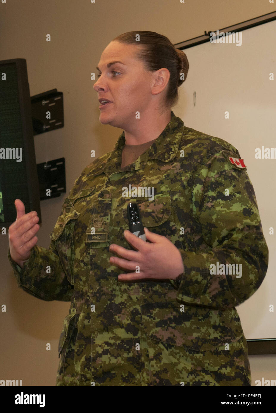 Warrant Officer Stephanie Cyr, 2nd Canadian Division, briefs Vermont ...