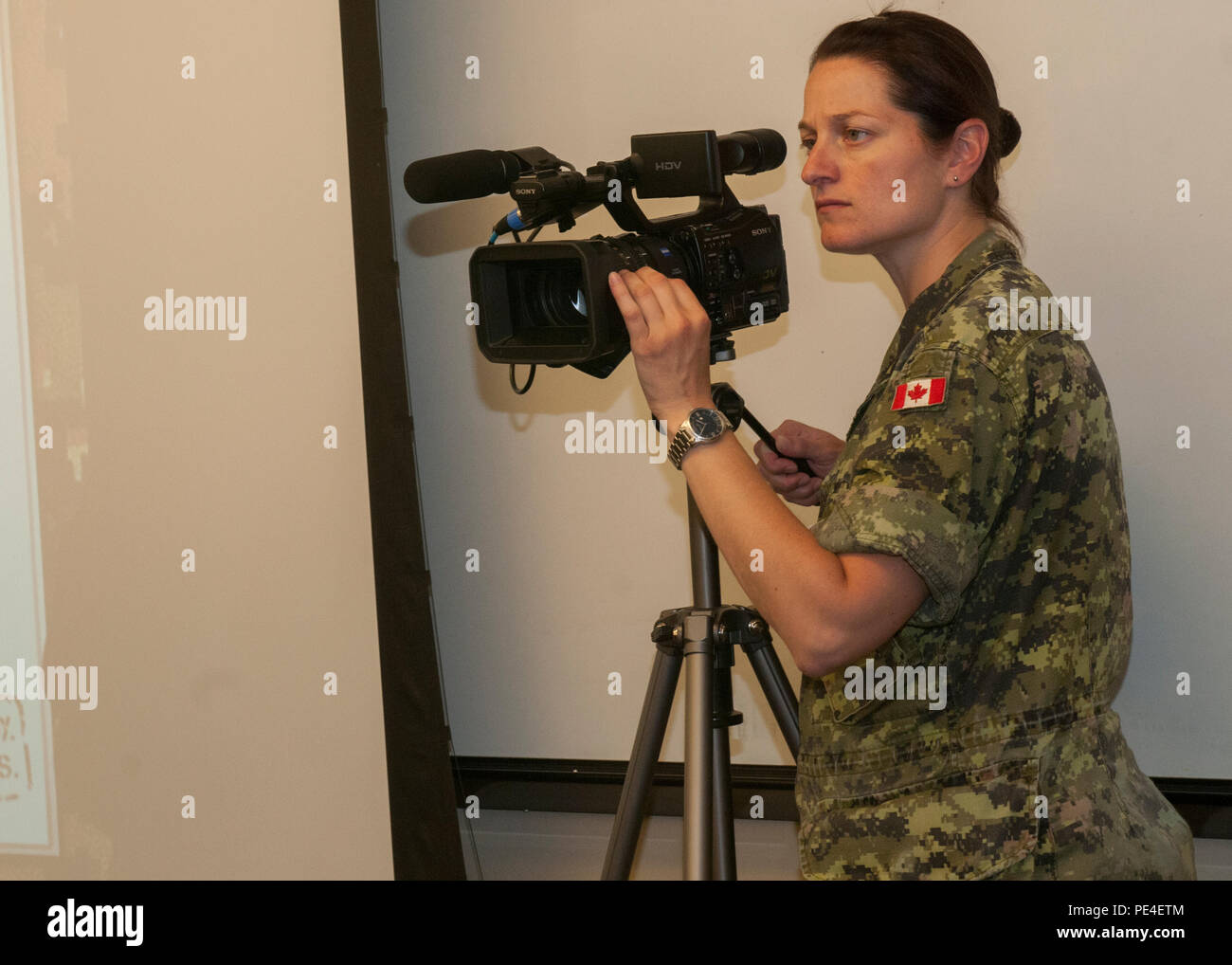 A 2nd Canadian Division Soldier films an integration of women in the ...