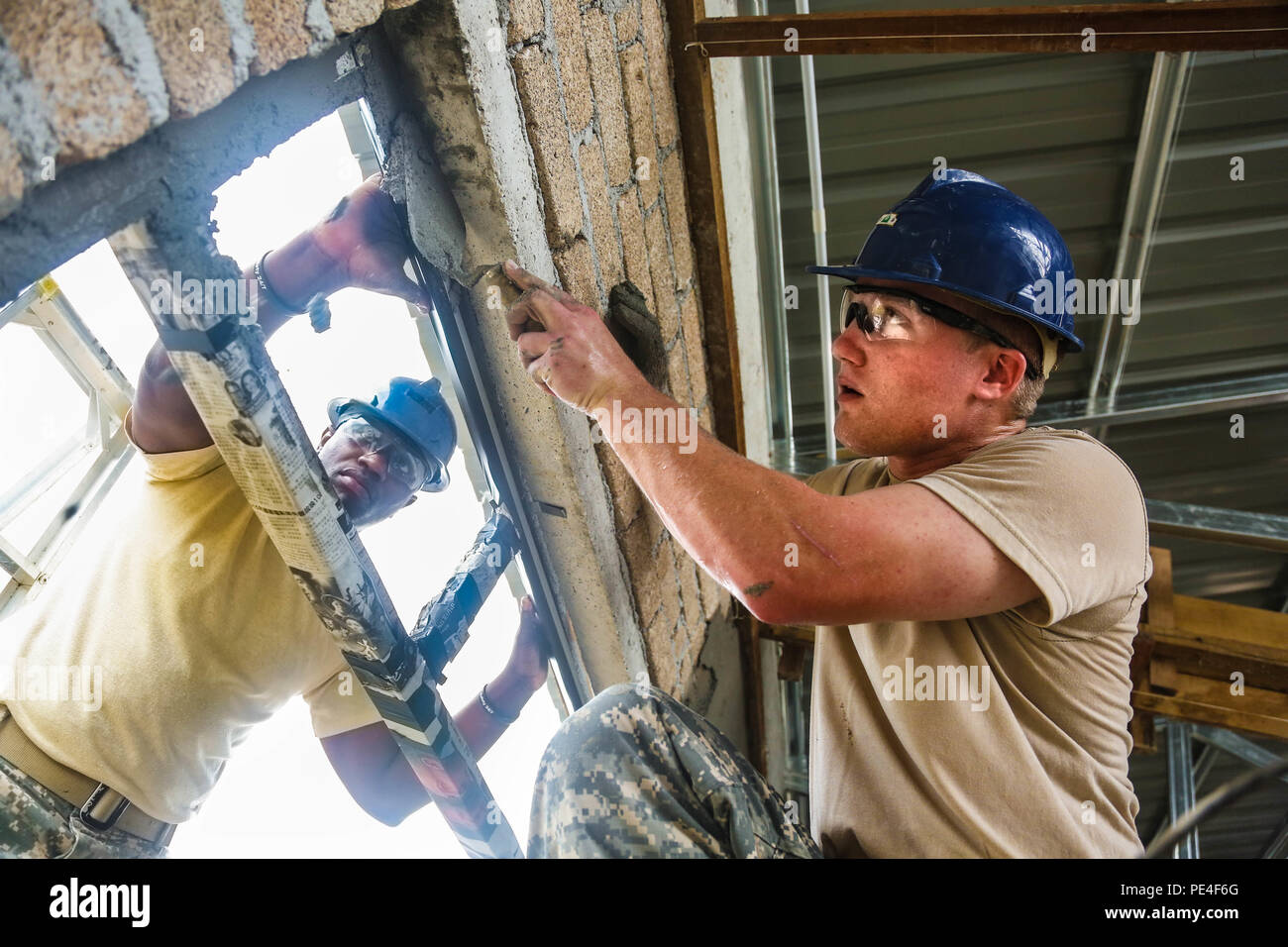 U.S. Army Spc. Justin Moore (left) and Spc. Benjamin Steckler (right ...