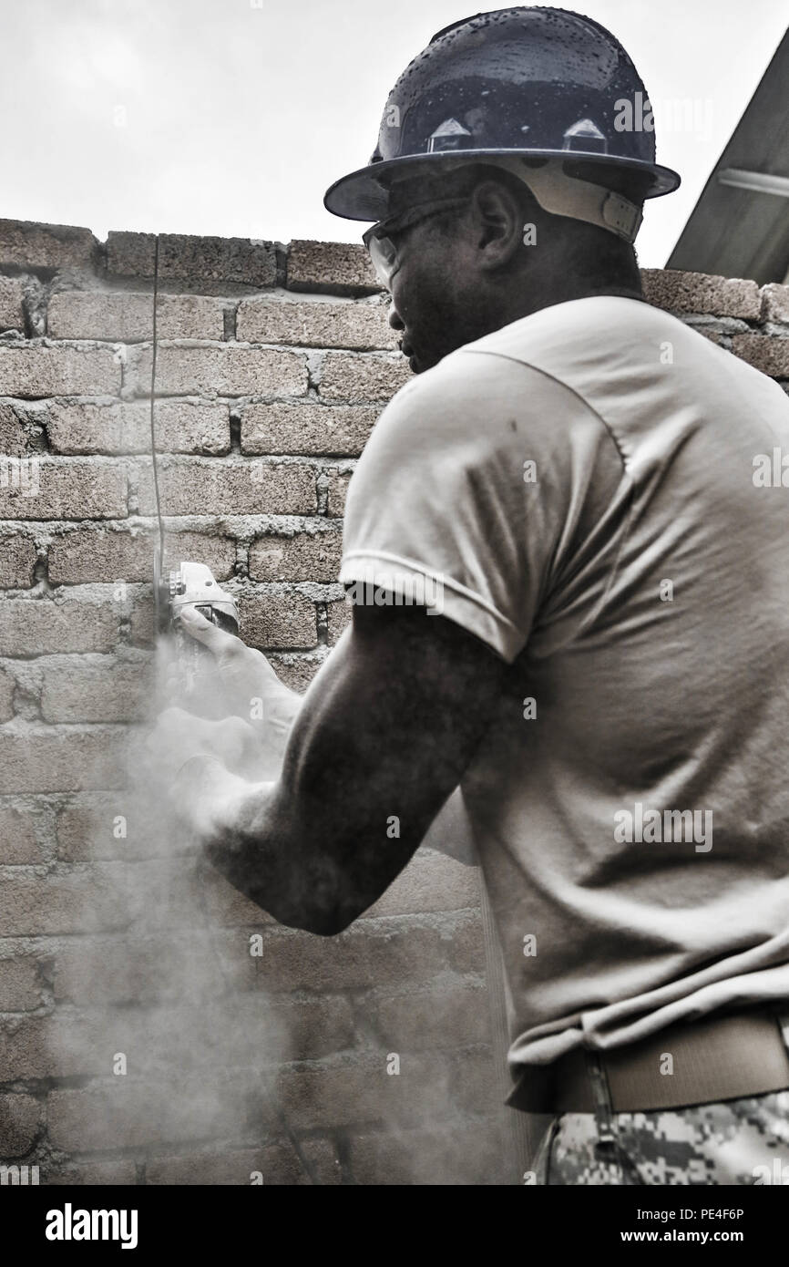 U.S. Army Spc. Chris Dobbins, a Louisiana National Guardsman plummer ...