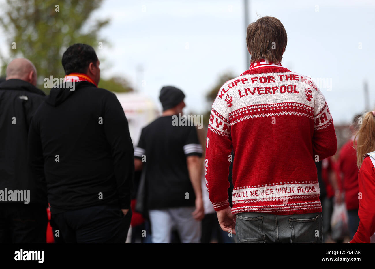 A Liverpool fan wearing a knitted jumper outside the ground before the ...