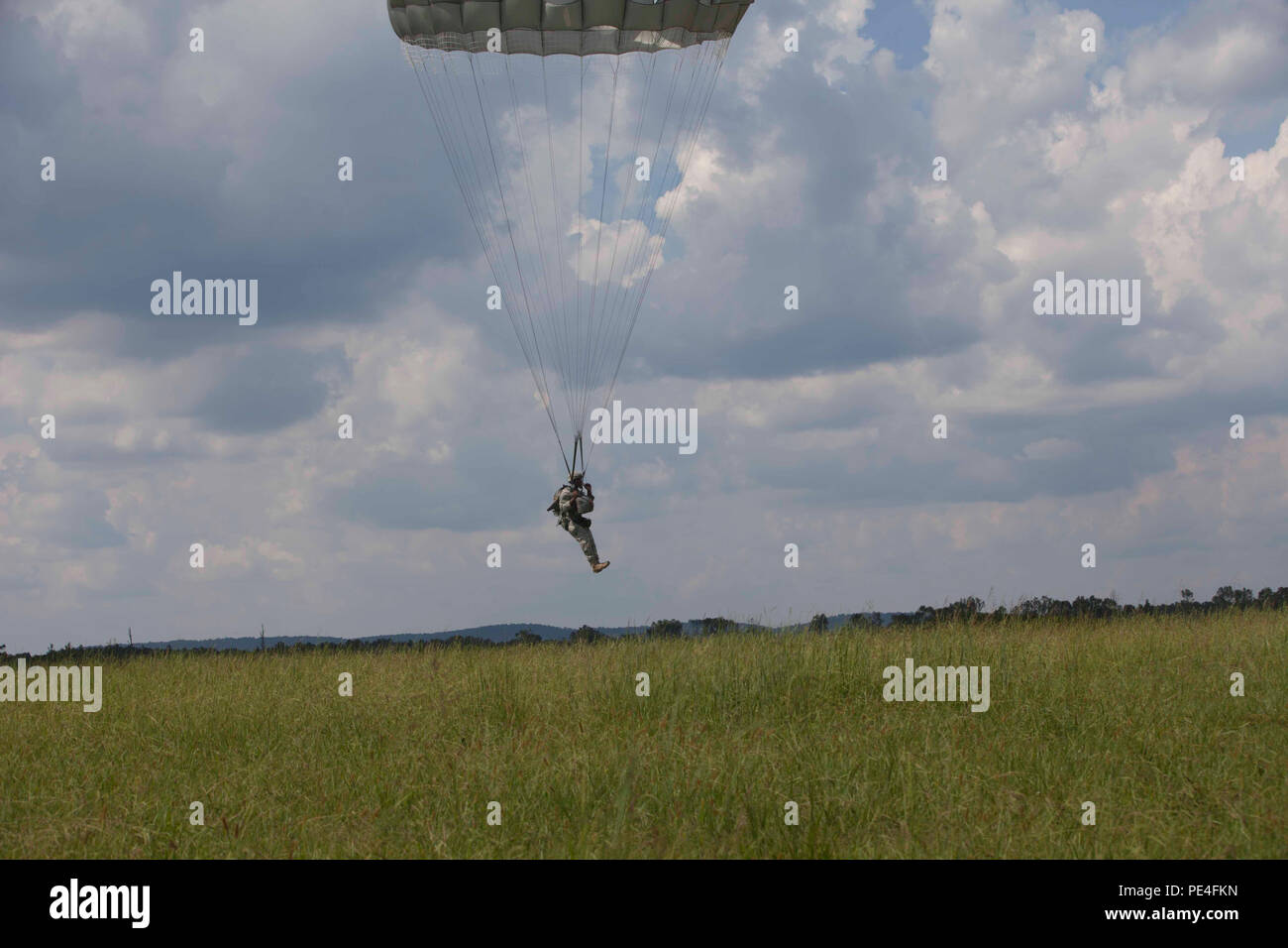A U.S. Army paratrooper descends onto Steve Osborne drop zone for a ...