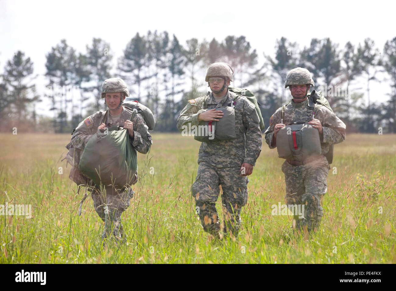 U.S. Army paratroopers walk across Steve Osborne drop zone after a Sept ...