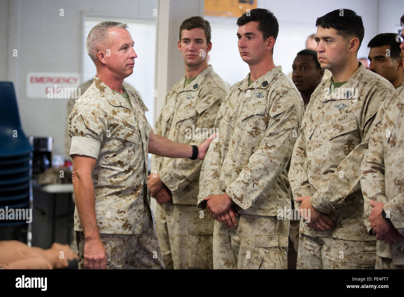U.S. Marine Corps Col. Scott D. Leonard, left, commanding officer ...